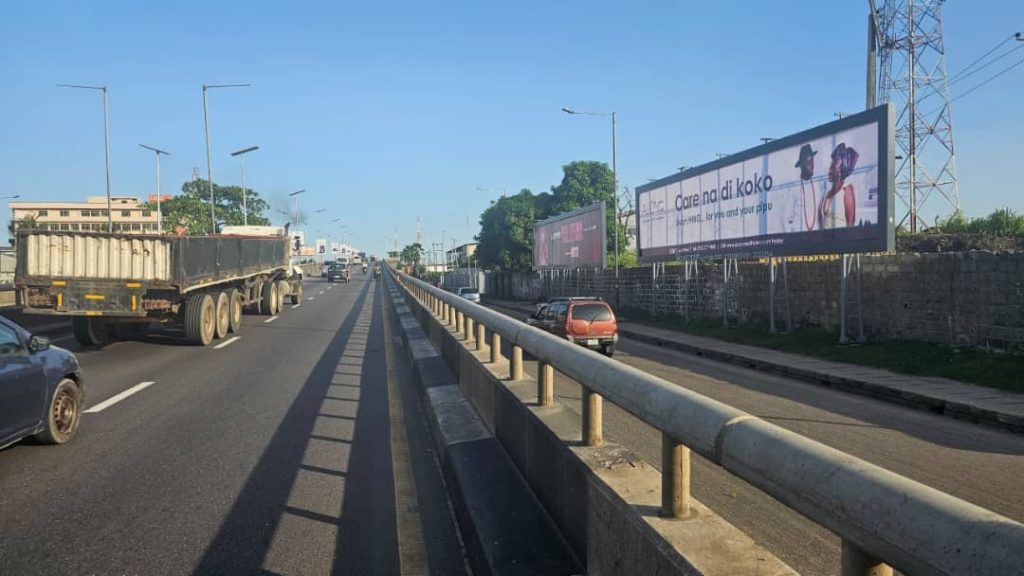 Wallmount Billboard at end of Bode Thomas Junction, Along Iponri market ...